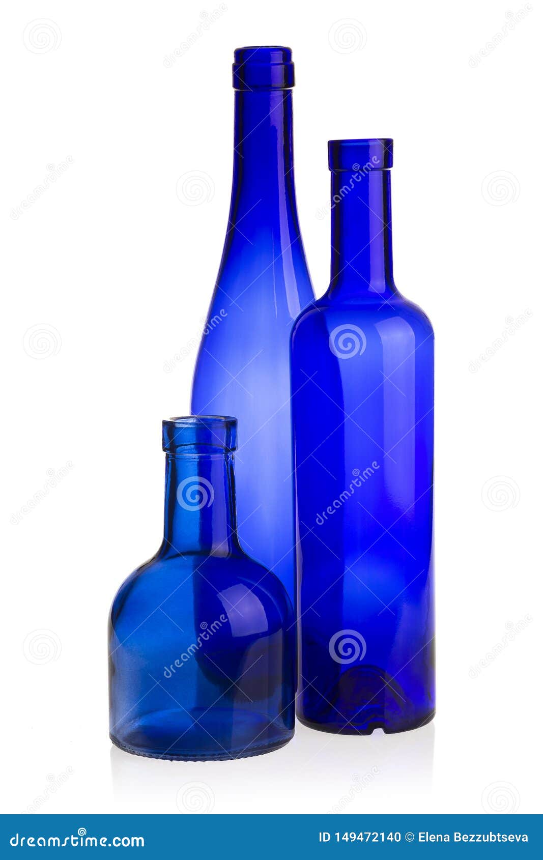 Tres Botellas De Cristal Azules Foto de archivo - Imagen de aislado ...