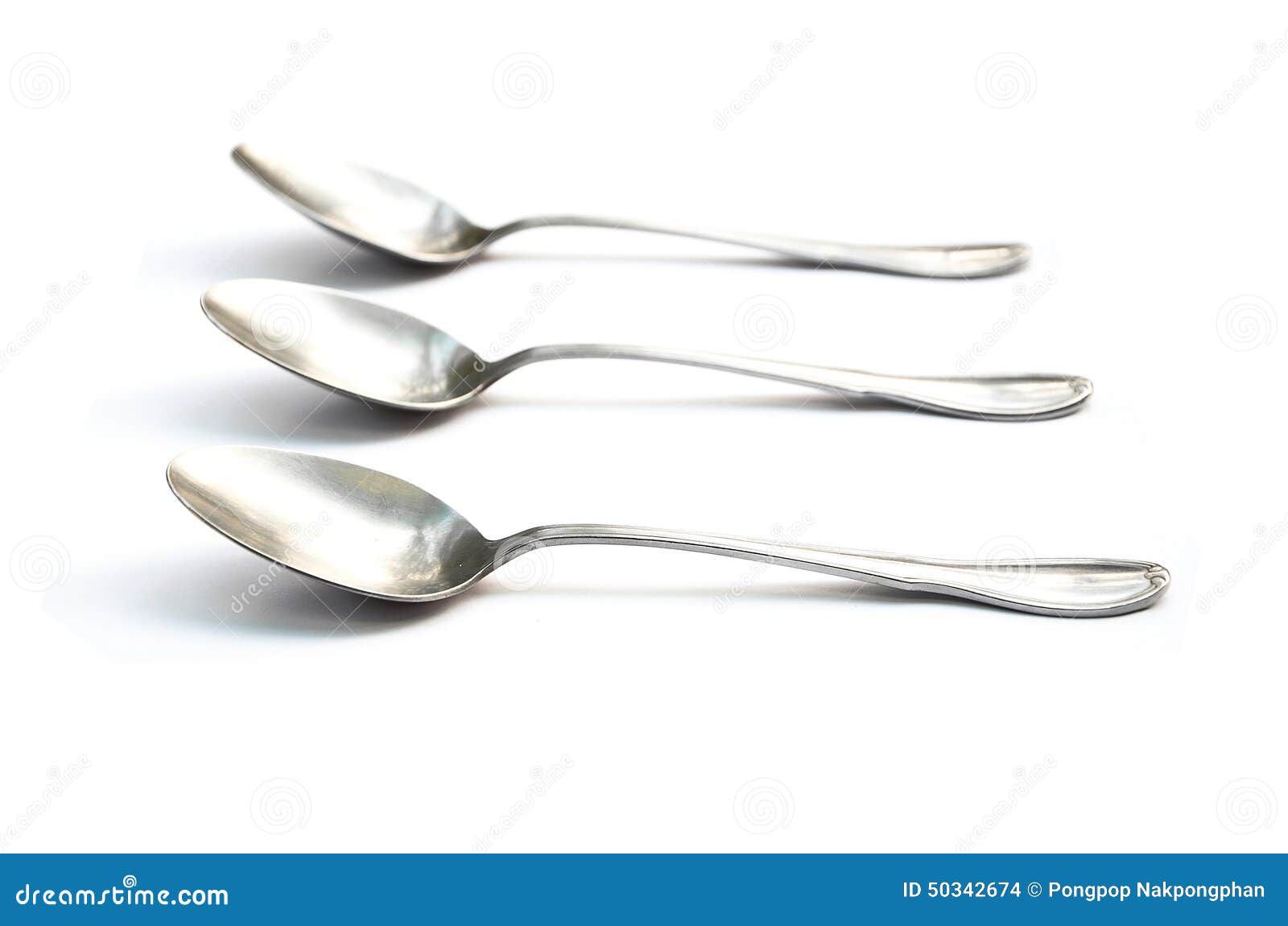 Tres cucharas aisladas foto de archivo. Imagen de arreglo - 50342674