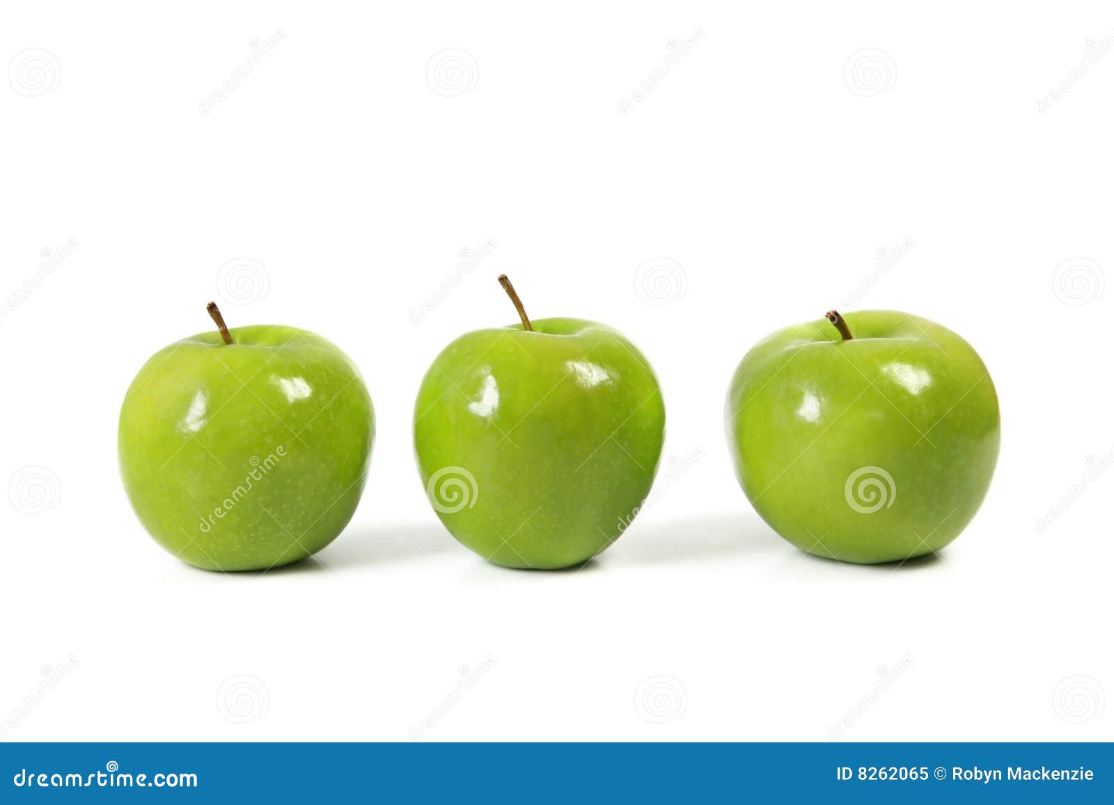 Tres manzanas verdes imagen de archivo. Imagen de imagen - 8262065