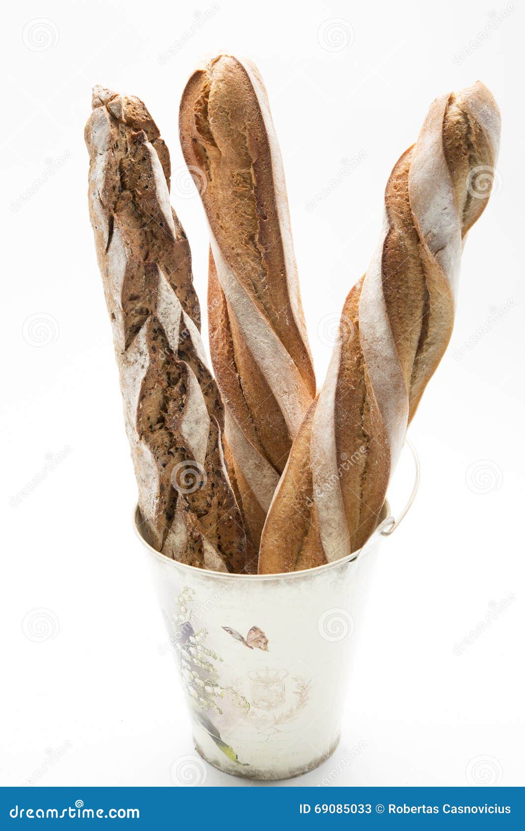 Tres Panes Franceses En Cubo Imagen de archivo - Imagen de primer ...