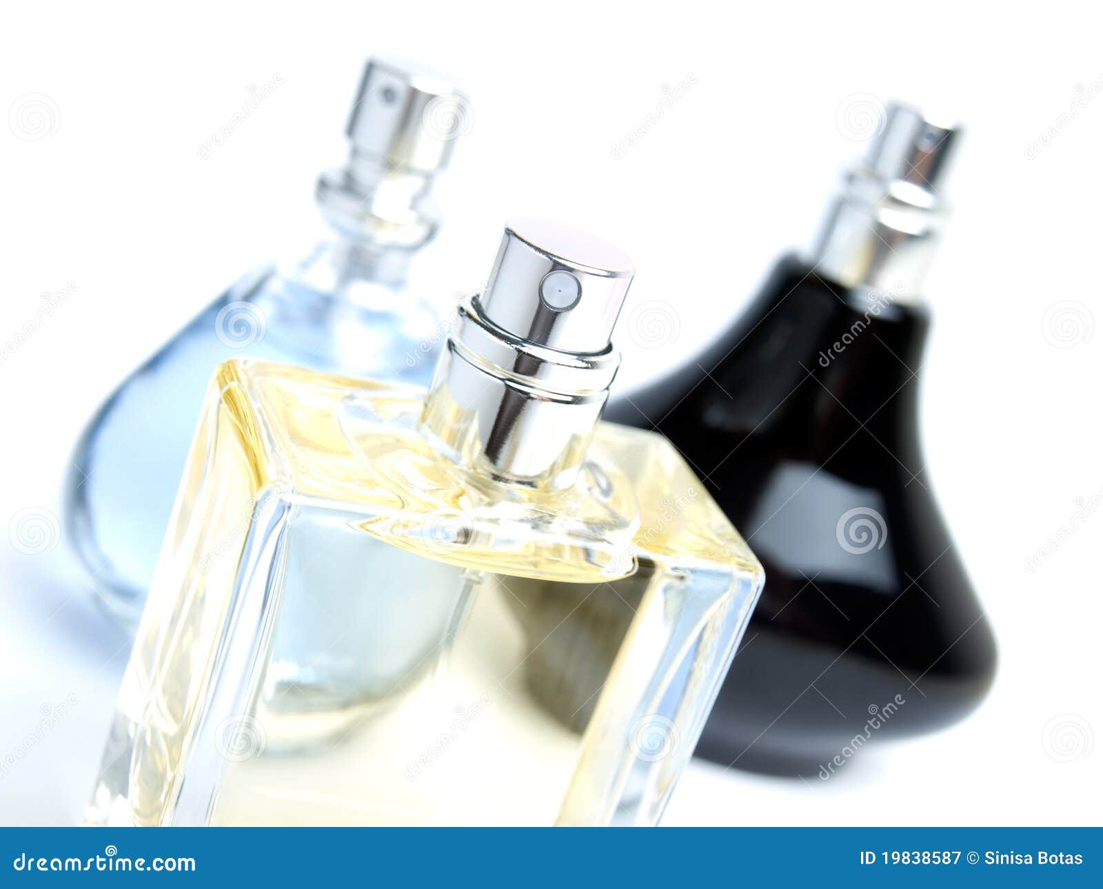 Tres perfumes imagen de archivo. Imagen de cosméticos - 19838587