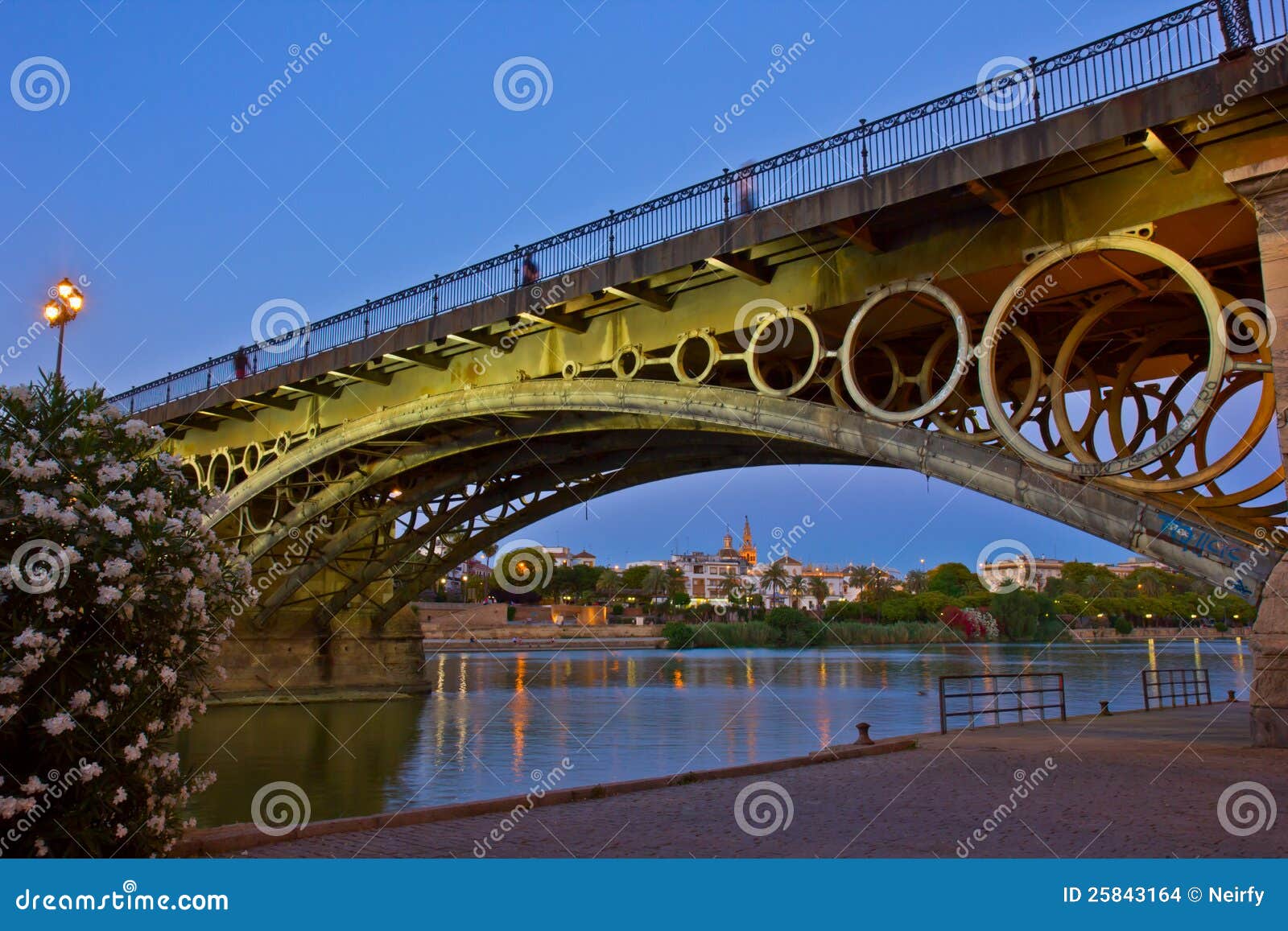 Triana Bridge at Night, Seville, Spain Stock Photo - Image of romance ...