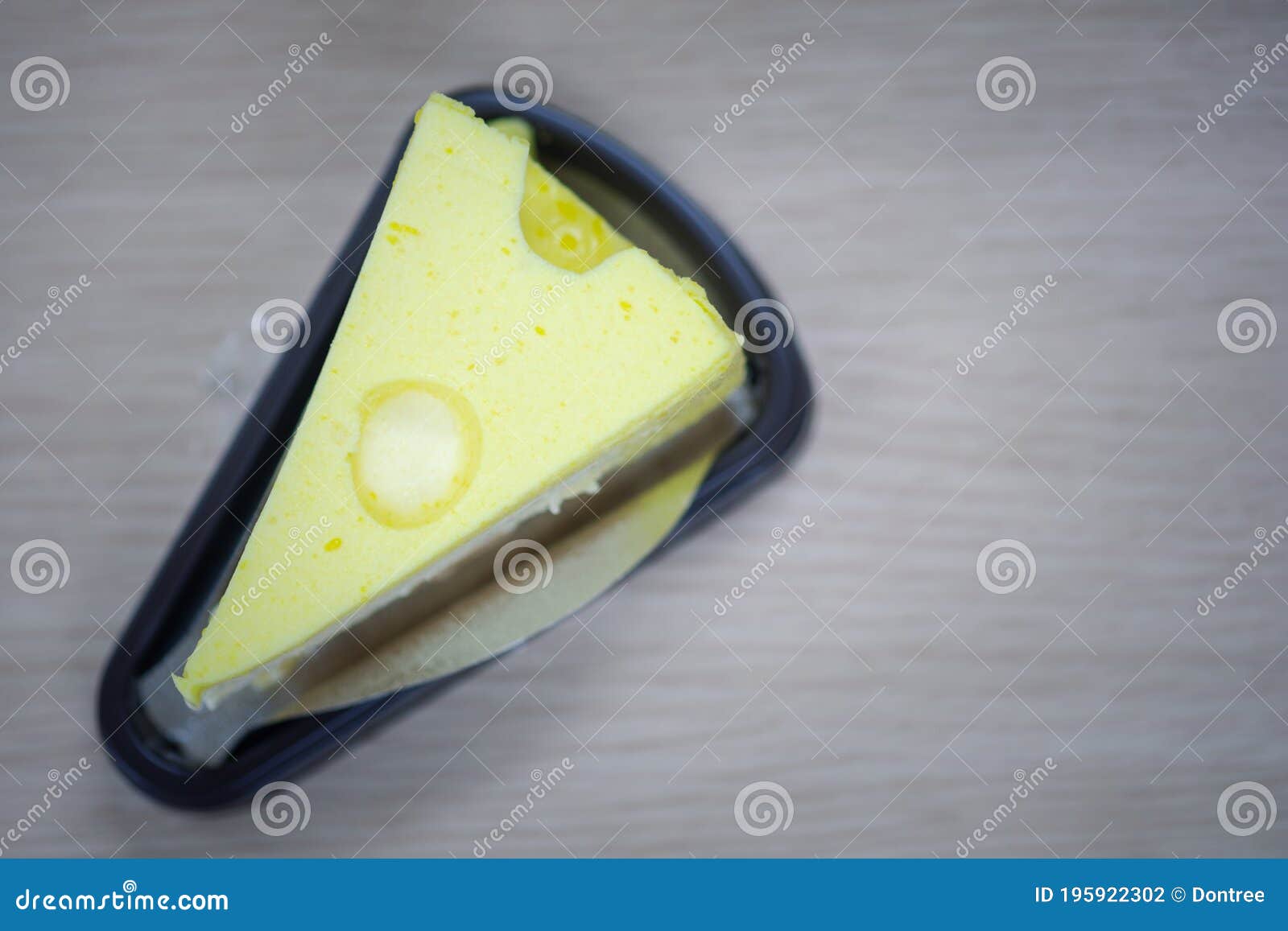 Triangle Cheesecake in Package Put on Wood Table Stock Photo - Image of ...