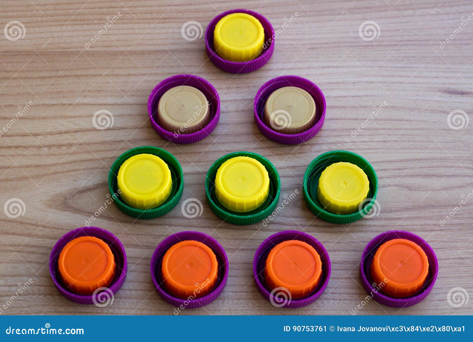 Triangle of Colorful Plastic Lids Stock Image - Image of circle ...