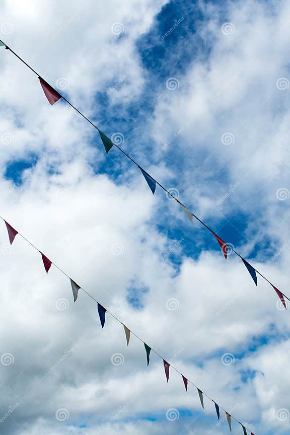 Triangle Flag Hanging on the Rope and Blue Sky Stock Photo - Image of ...