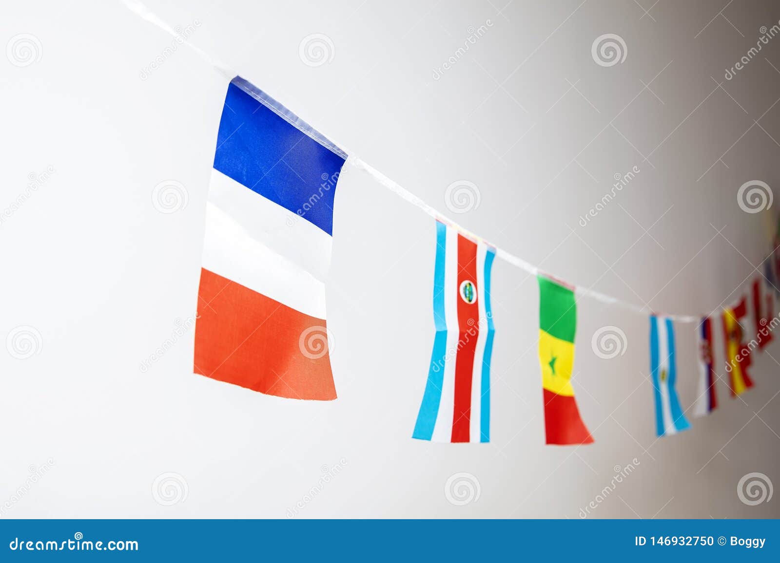 Triangle Flags of Various Countries Hanging on the Rope Stock Photo ...