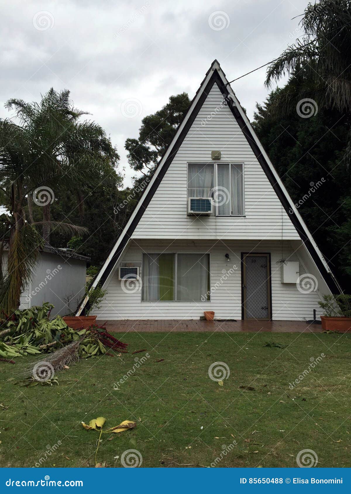 The triangle house stock photo. Image of estate, shape - 85650488