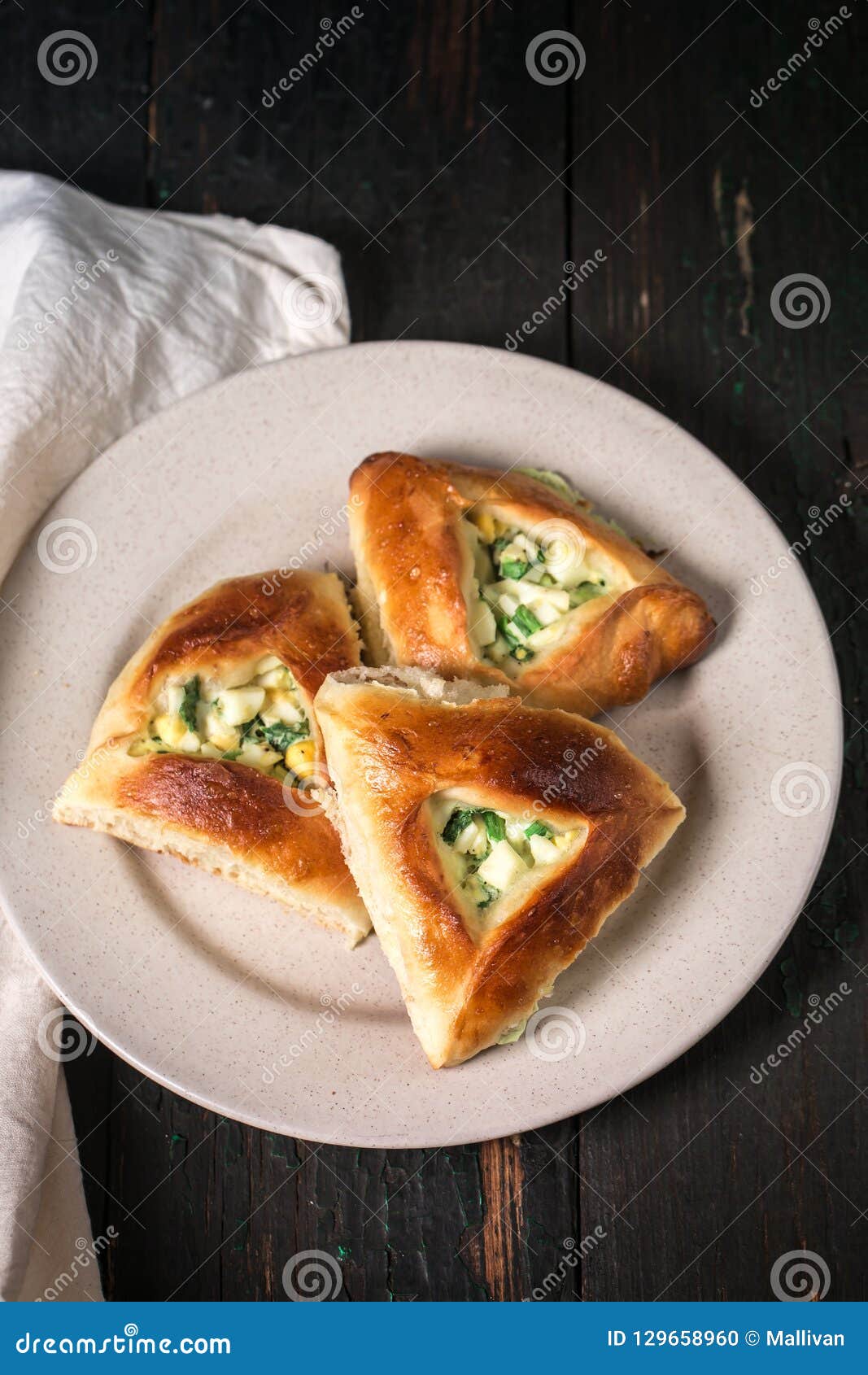 Triangle pie with onion stock photo. Image of cloth - 129658960