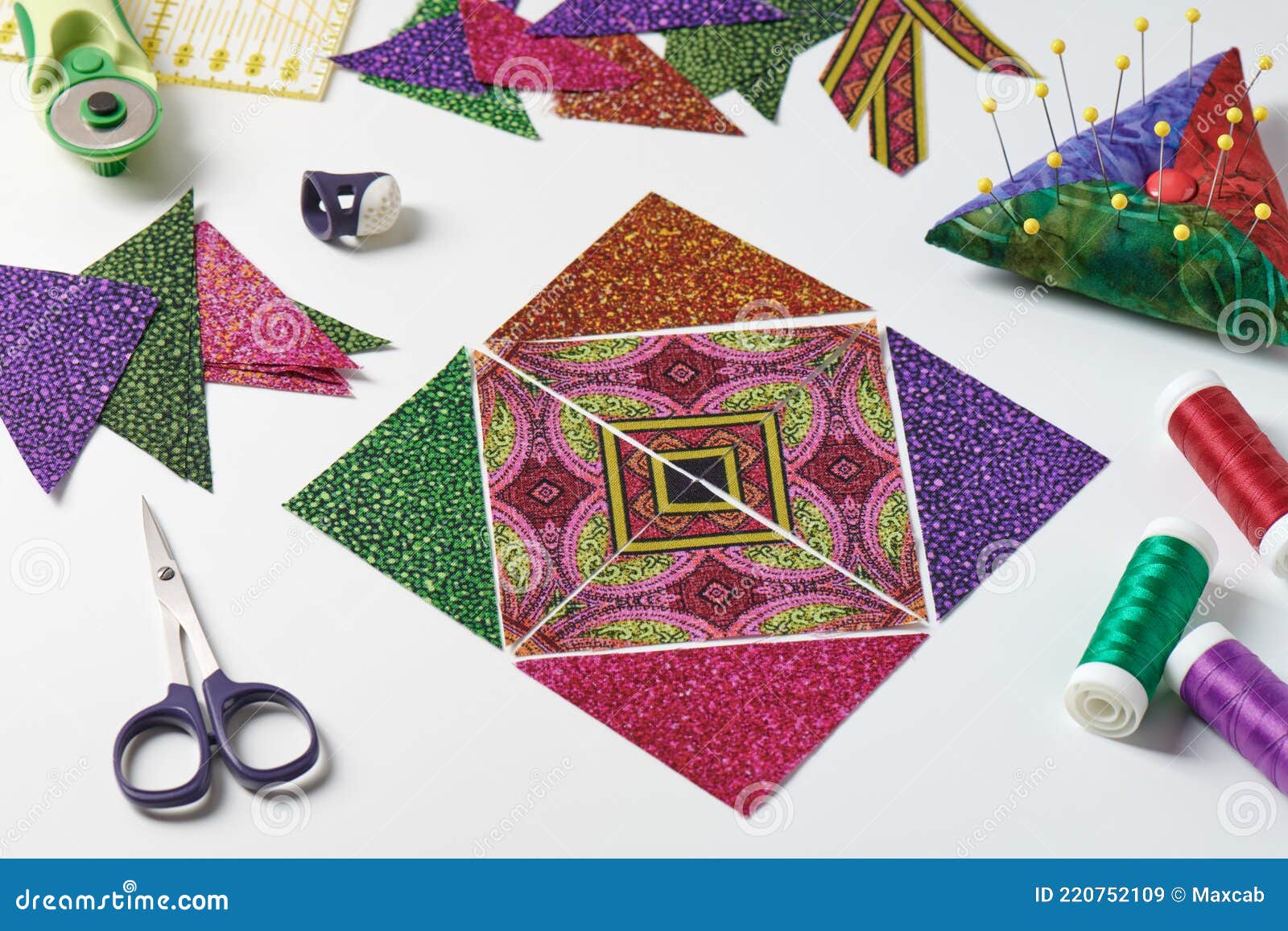 Triangle Pieces of Fabric Laid Out in the Shape of a Patchwork Block ...