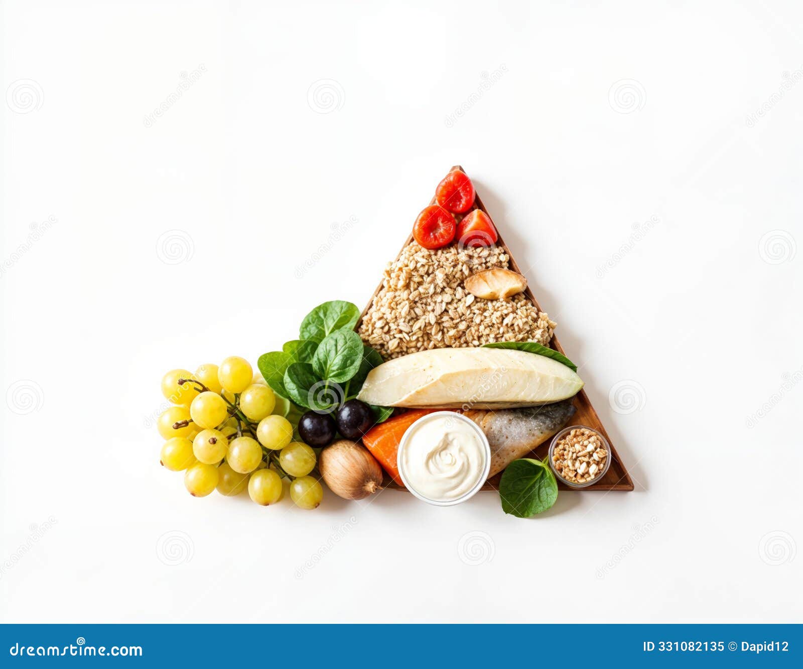 A Triangle Shaped Pyramid Plate with Various Foods on it Stock ...