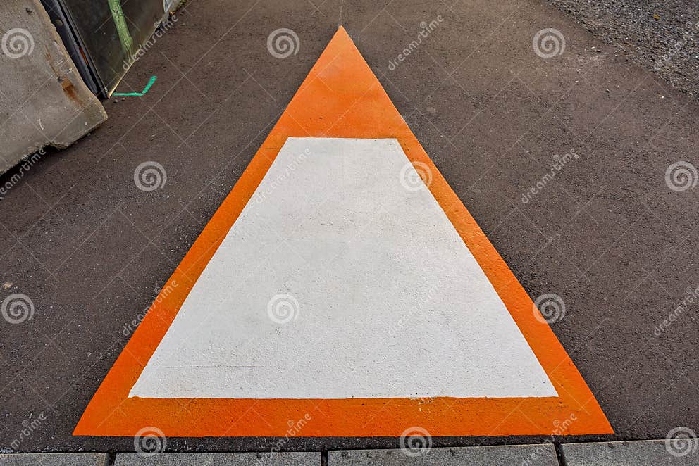 Triangle Sign Pavement stock photo. Image of shape, direction - 161207110