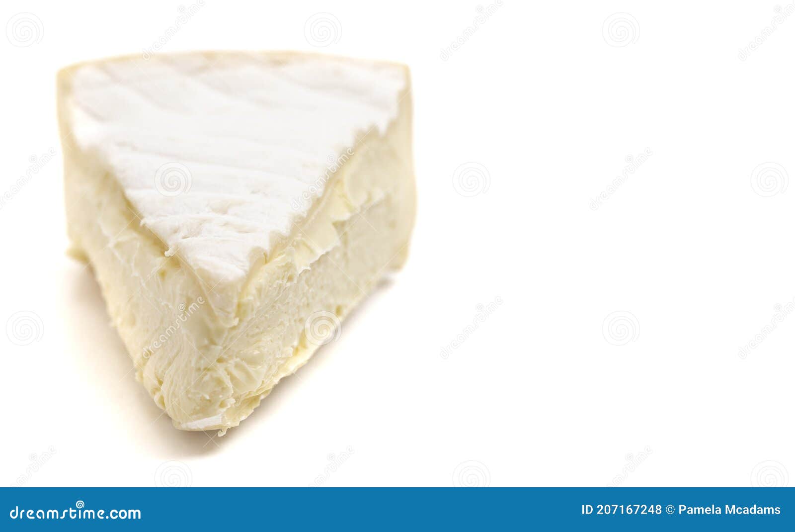 Triangle Slice of a Soft White Cheese with a Rine on a White Background ...