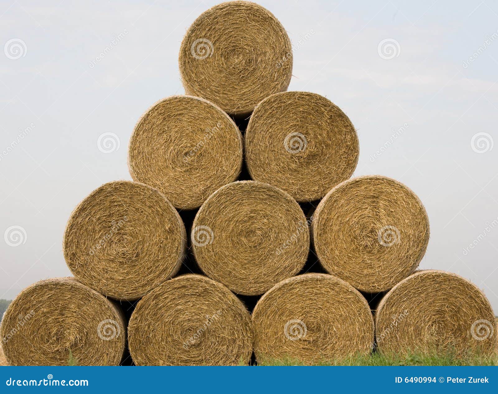 Triangle of straw rolls. stock photo. Image of roll, straw - 6490994