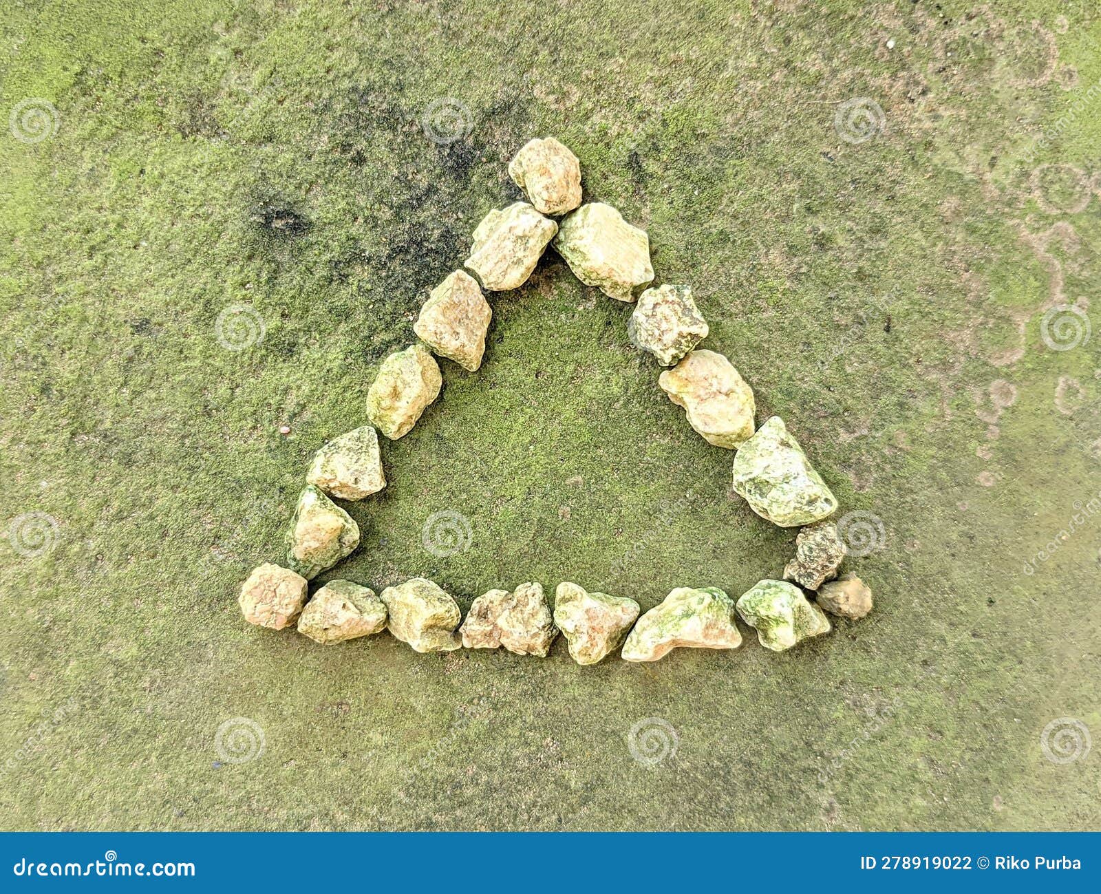 A Triangular Arrangement of Karst Stones with a Mossy Background Stock ...