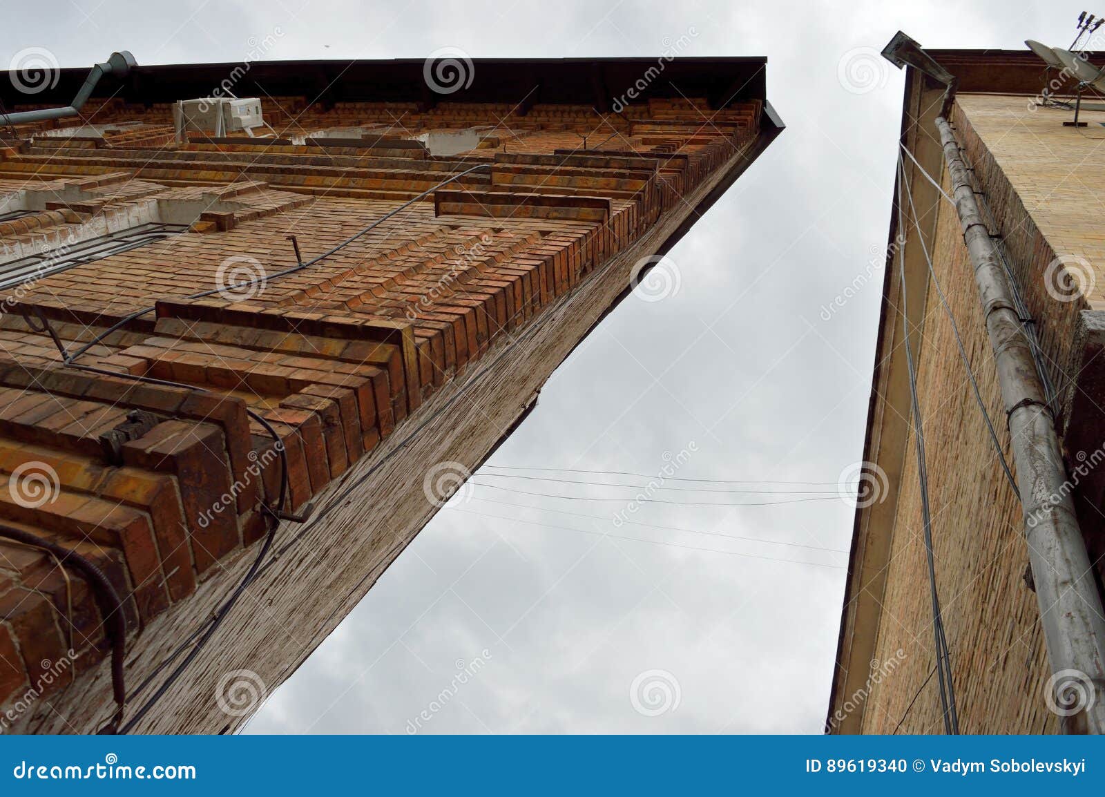 Triangular building stock photo. Image of trigonal, brick - 89619340