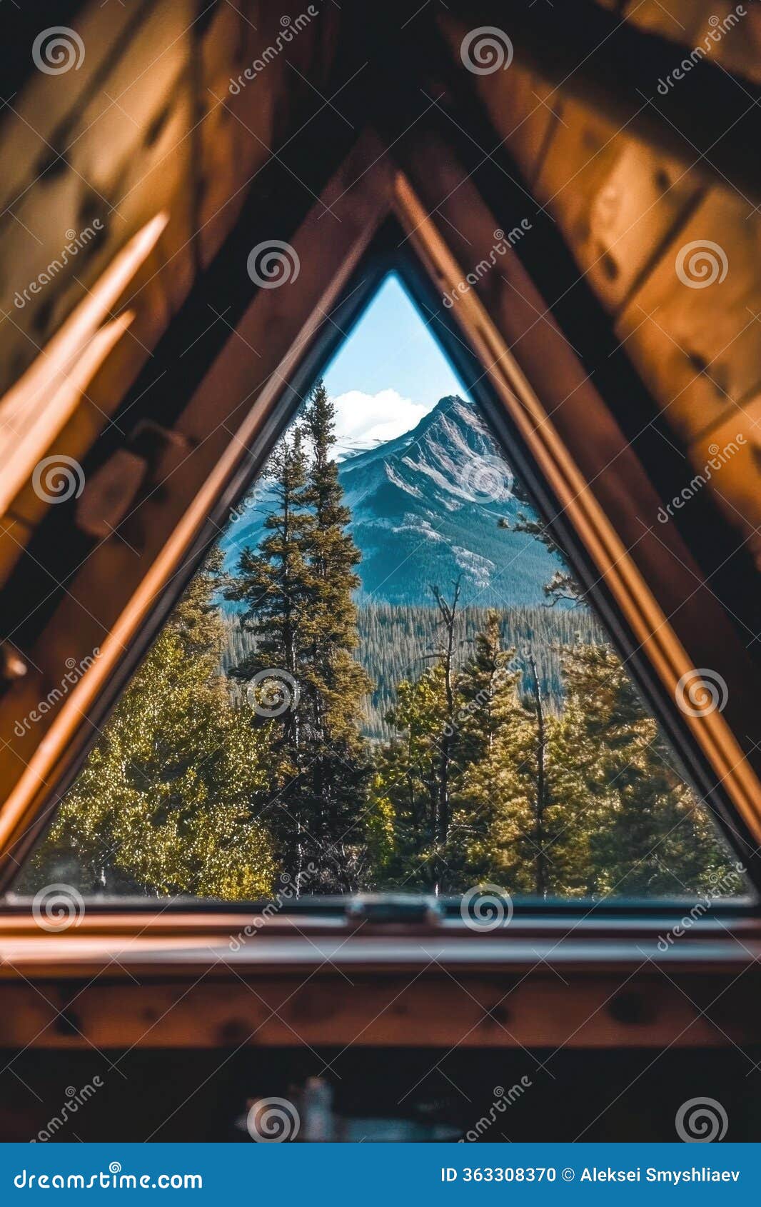 Triangular Cabin Window Framing Mountain and Forest Views in Rustic ...