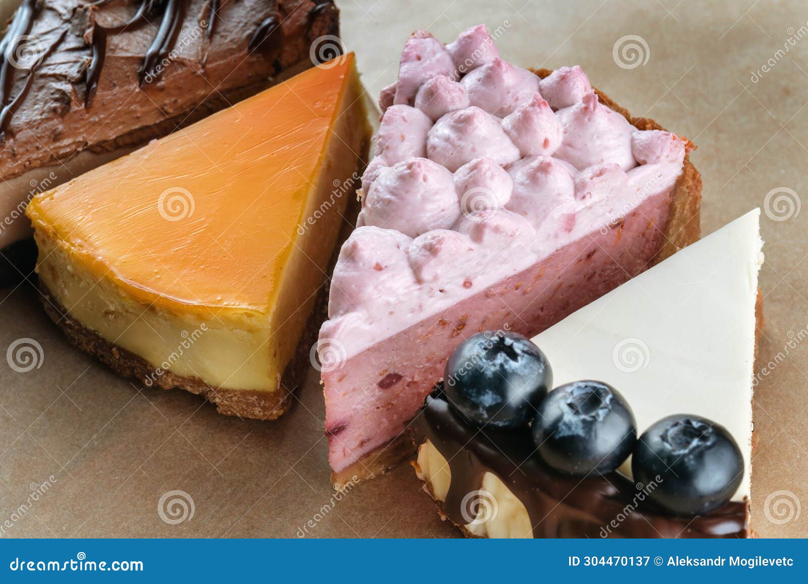 Triangular Cake Pieces Assorted Flavors, Coconut, Chocolate, Orange ...