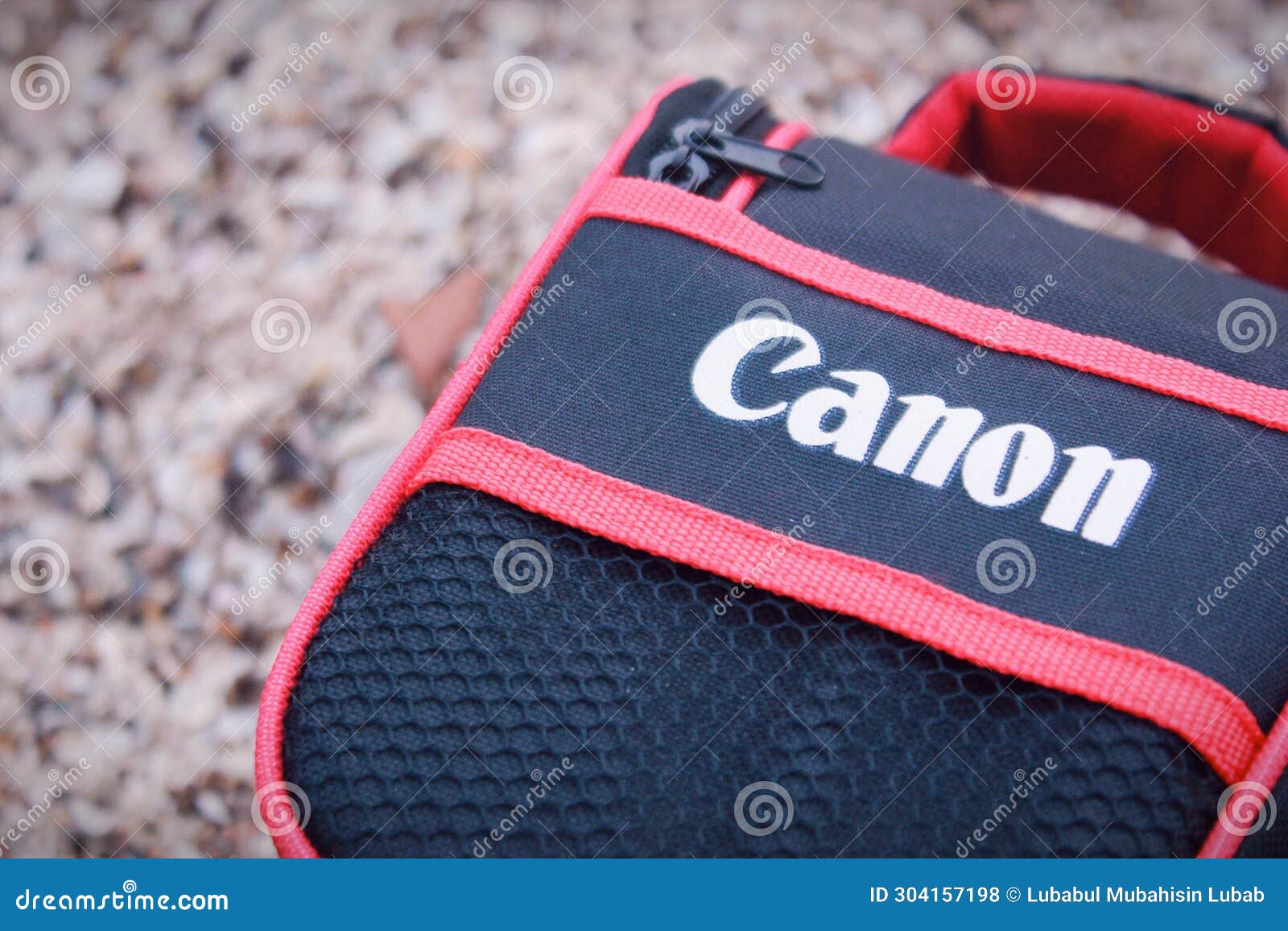A Triangular Canon Camera Bag for the Camera Body and One Lens ...