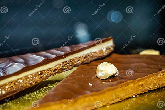 Triangular chocolate piece stock photo. Image of sugar - 154872738