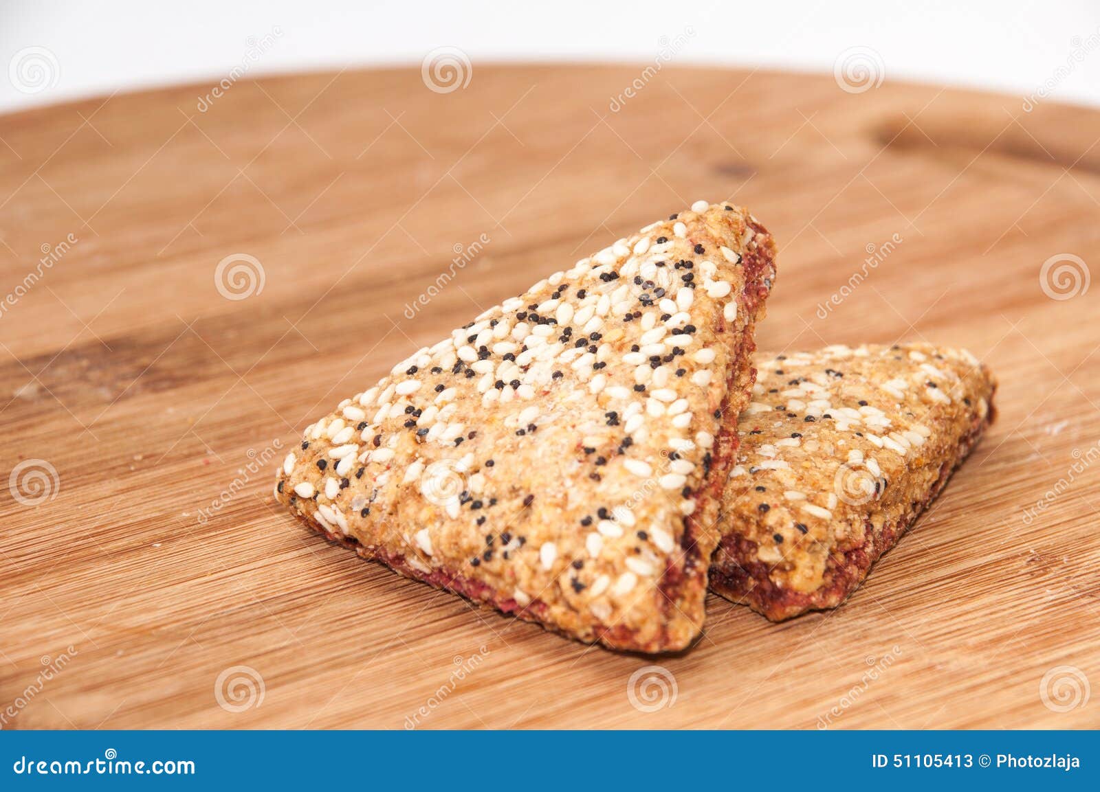 The Triangular Cookies with Cherries on a Kitchen Wooden Board Stock ...