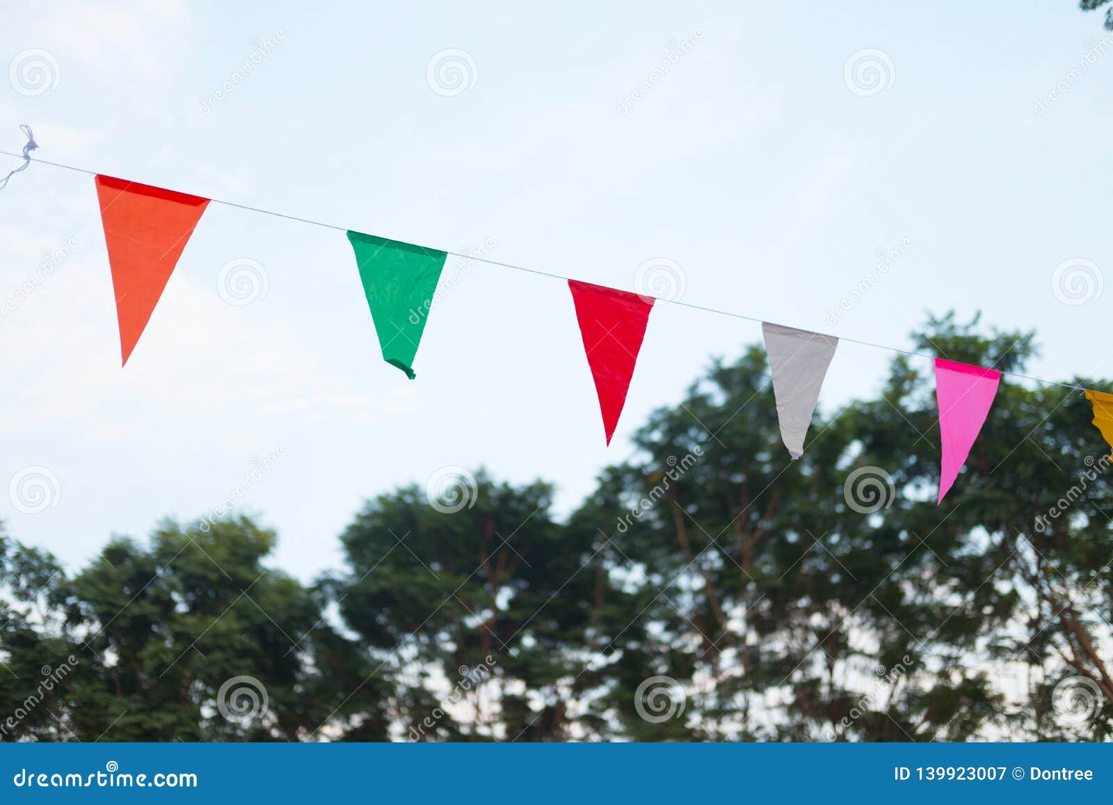 Triangular Flags Hanging in the Sky at an Outdoor Stock Image - Image ...