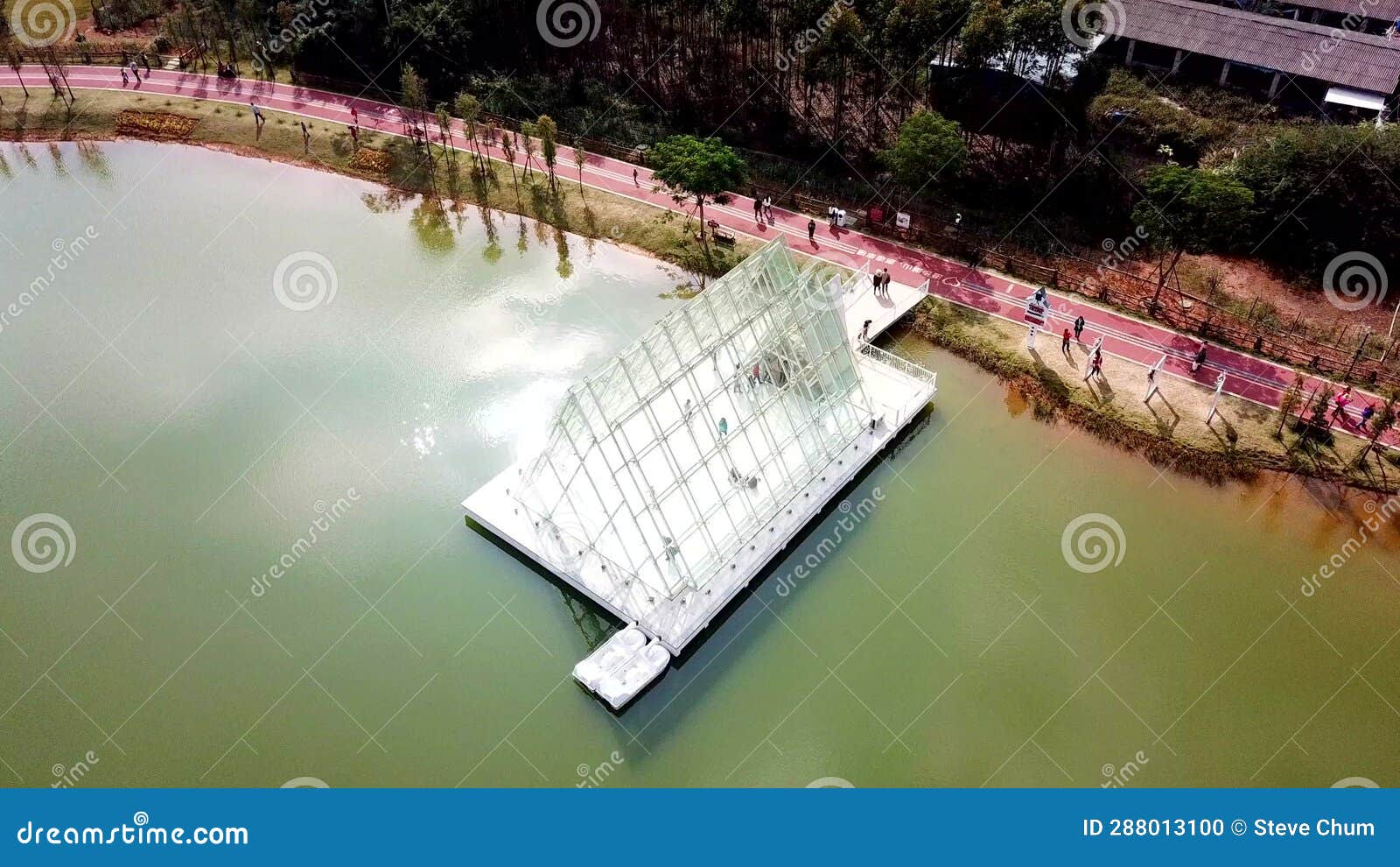 A Triangular Glass House on the Water Stock Footage - Video of ...
