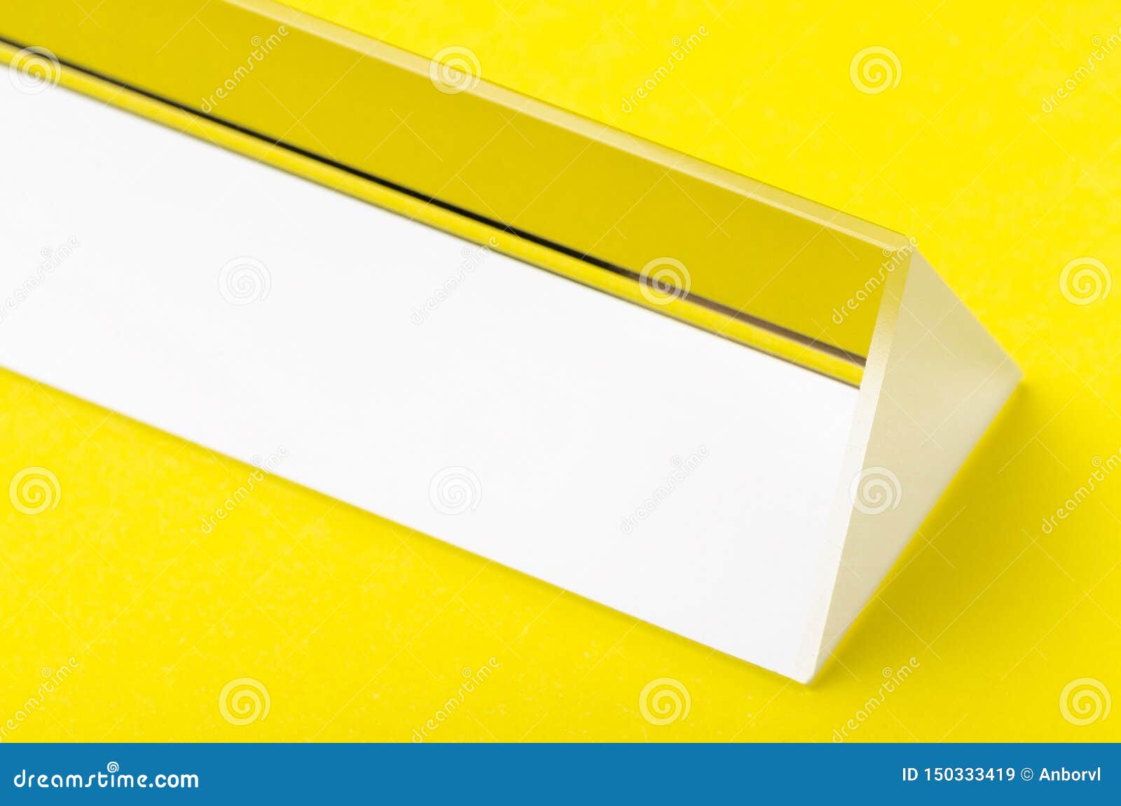 Triangular Glass Prism on Yellow Background Stock Image - Image of ...