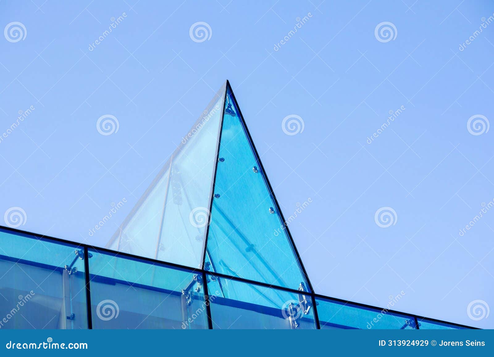 .the Triangular Glazed Facade of the Building is Oriented with a View ...