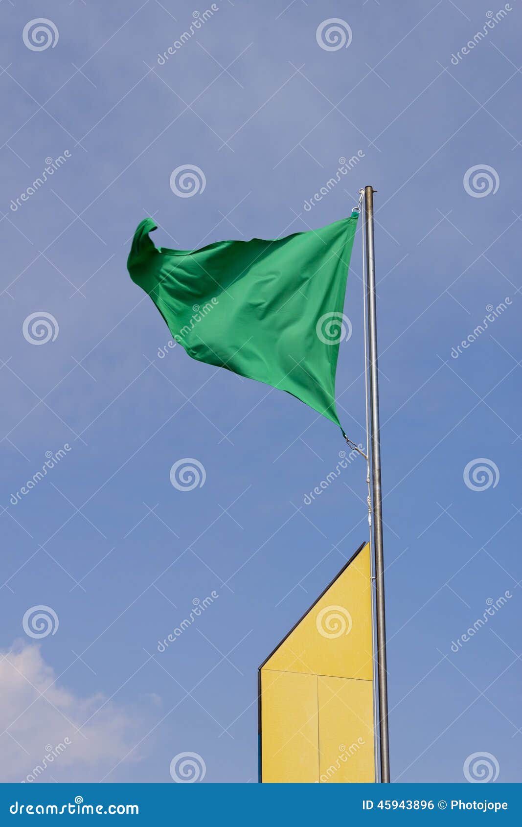 Triangular green flag. stock photo. Image of flag, summer - 45943896