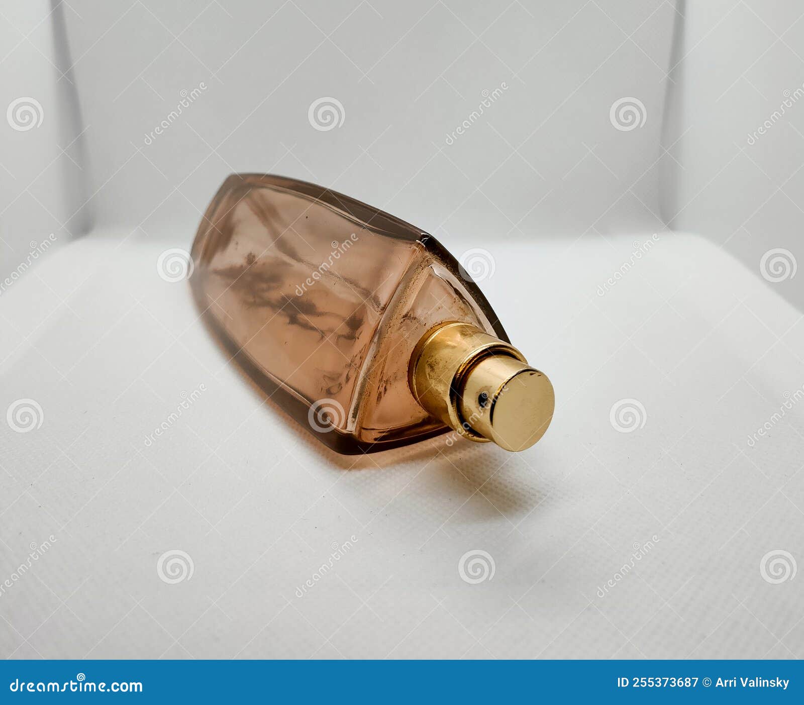 Triangular Orange Perfume Bottle Stock Image - Image of used, bottle ...