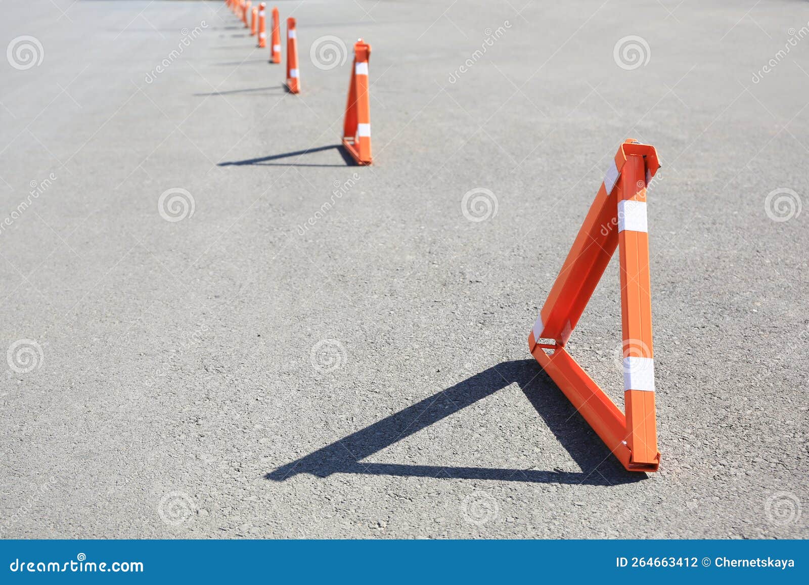 Triangular Parking Barriers on Asphalt Outdoors. Space for Text Stock ...