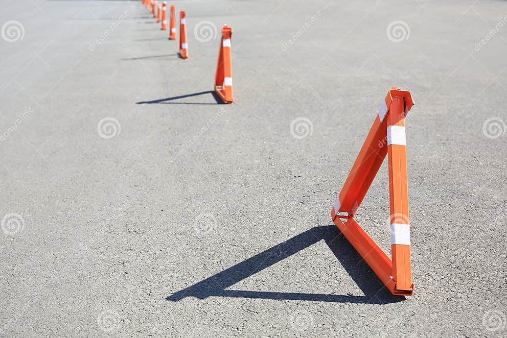 Triangular Parking Barriers on Asphalt Outdoors. Space for Text Stock ...