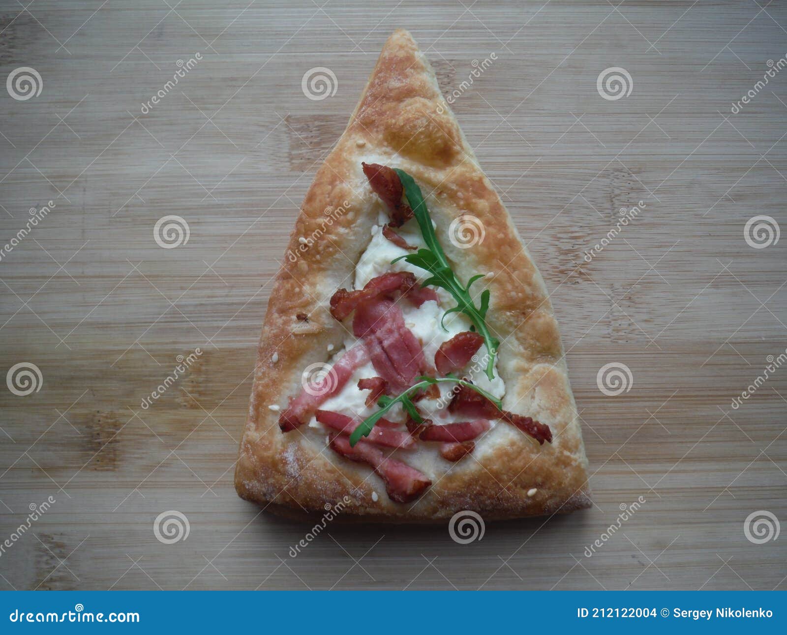 Triangular Patty with Ham, Cheese and Herbs on a Wooden Table. Stock ...