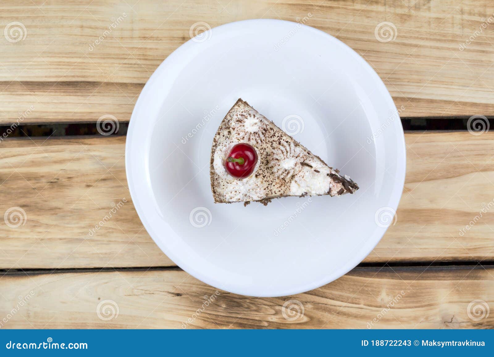 A Triangular Piece of Tiramisu Cake on a White Plate Stock Image ...