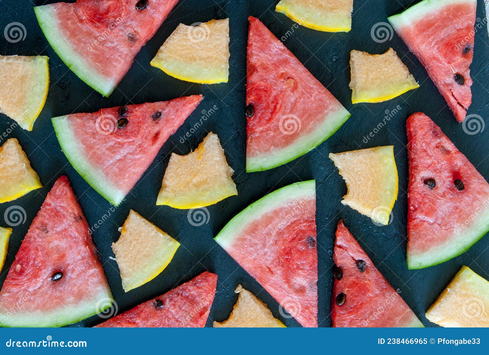 Triangular Pieces of Water Melon Spread on Black Stock Image - Image of ...