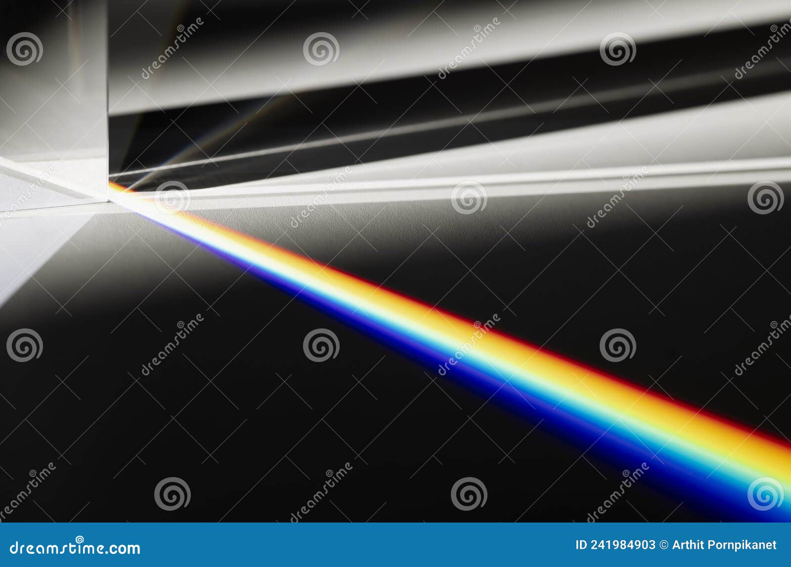 Triangular Prism Dispersing Sun Beam Splitting into a Spectrum on White ...