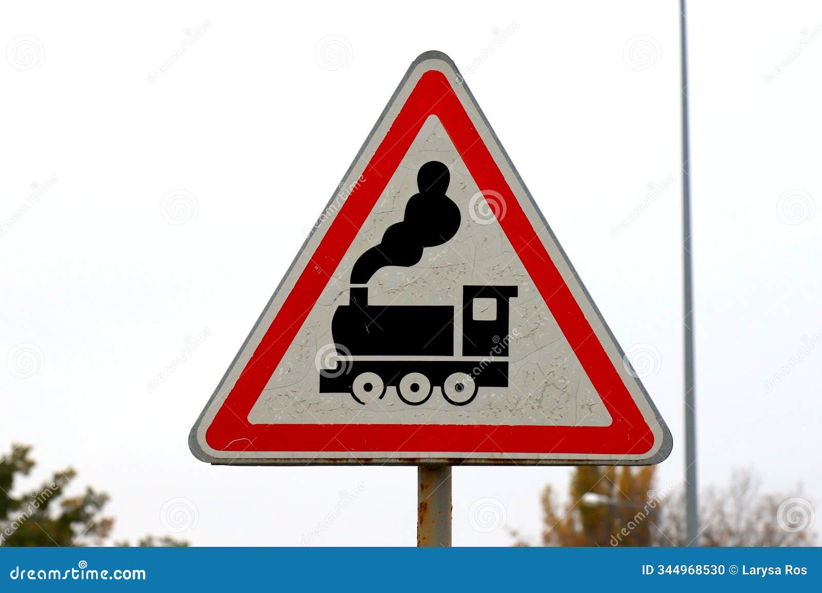 Triangular Road Sign Approaching Railway Crossing without a Barrier ...