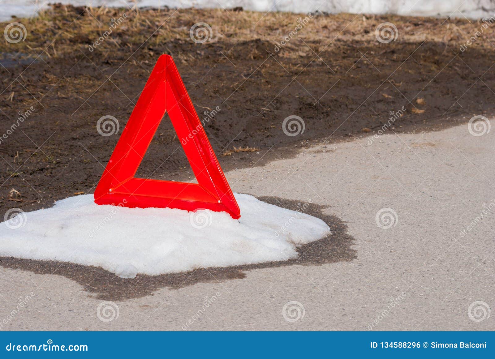 A Red Road Sign on the Ground Stock Photo - Image of road, street ...