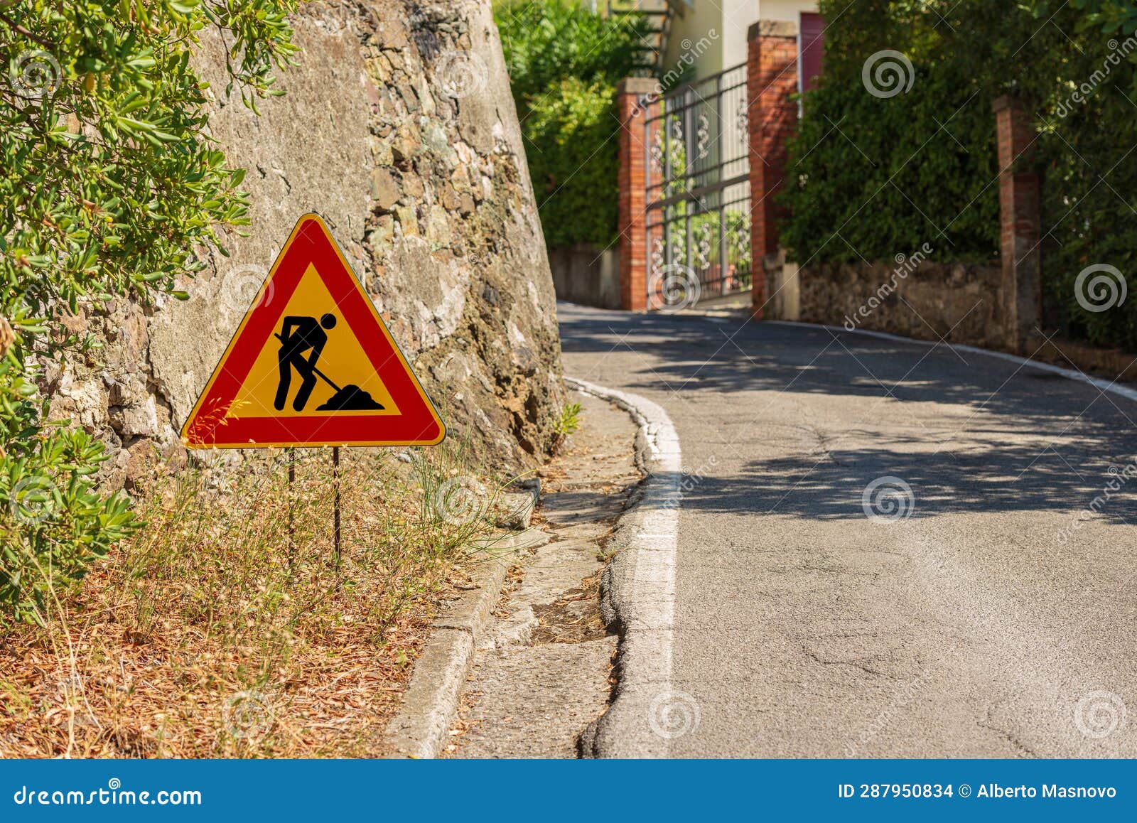 Triangular Road Sign of Men at Work or Work in Progress Sign Stock ...