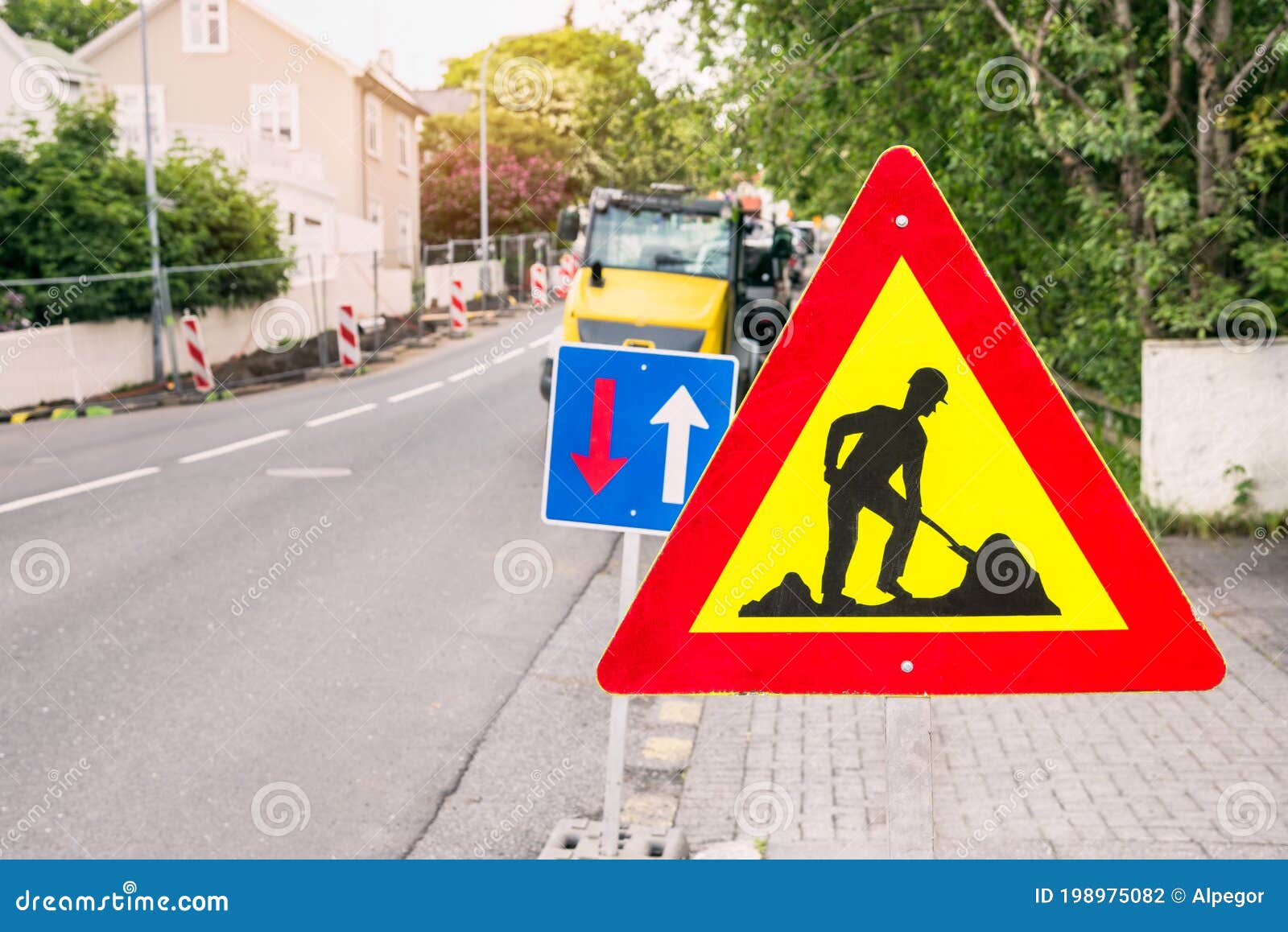 Triangular Roadworks Road Sign at the Beginning of a Construction Site ...