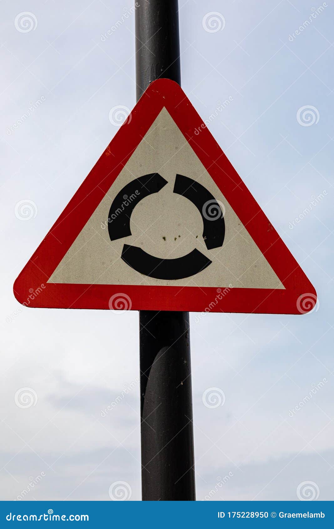 Roundabout Warning Triangle Road Sign, On Concrete Wall At The Exit Of ...