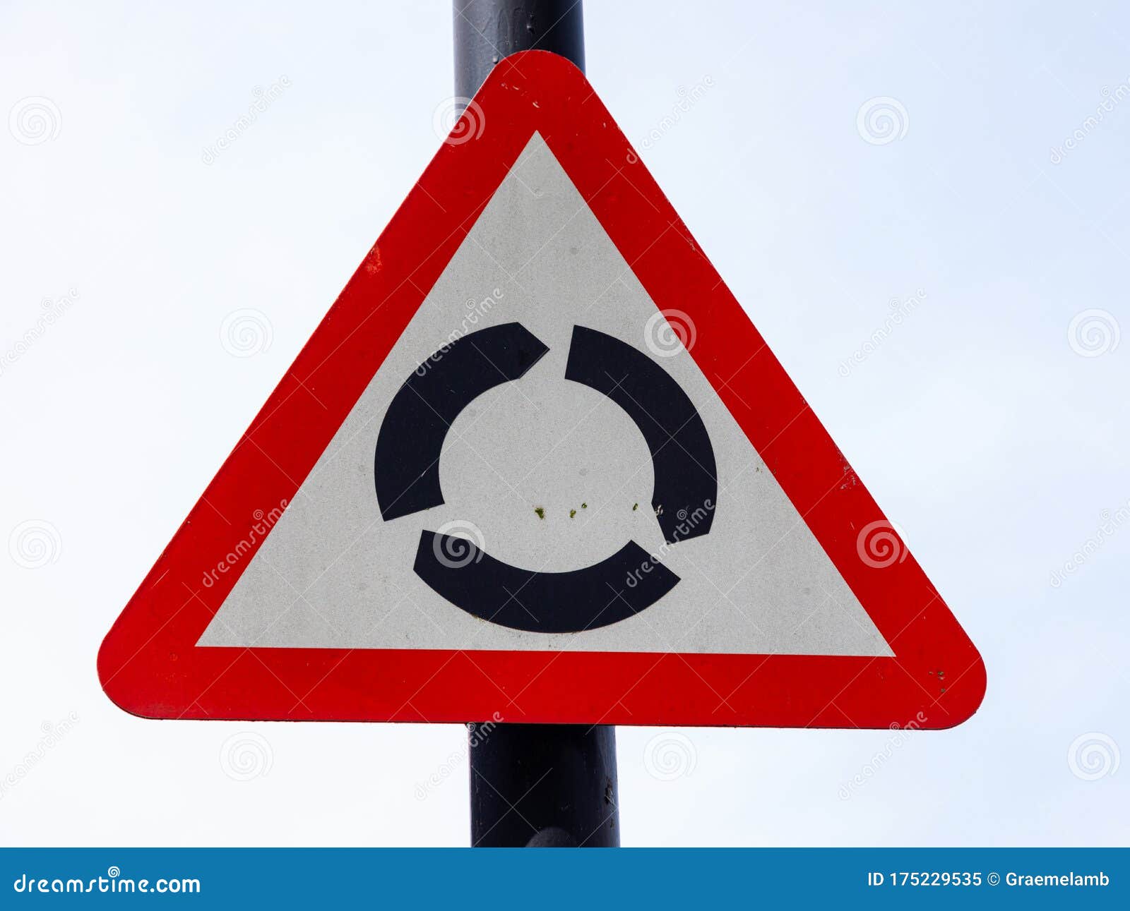 Roundabout Warning Triangle Road Sign, On Concrete Wall At The Exit Of ...