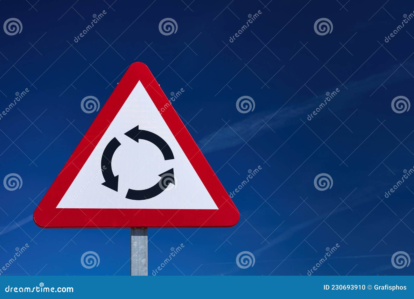 Roundabout Warning Triangle Road Sign, On Concrete Wall At The Exit Of ...