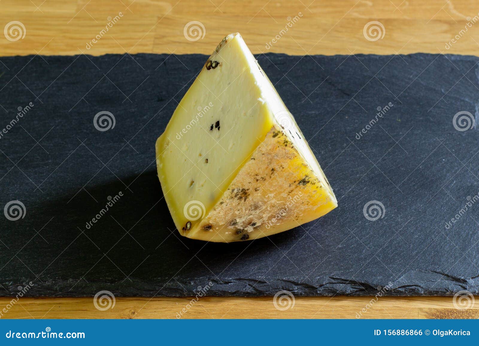 A Triangular Segment of Farm Curd Cheese with Allspice and Spices, a ...