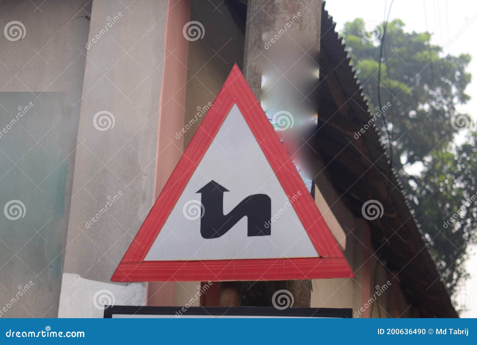 Triangular Shaped Road Sign beside a Road Stock Photo - Image of square ...