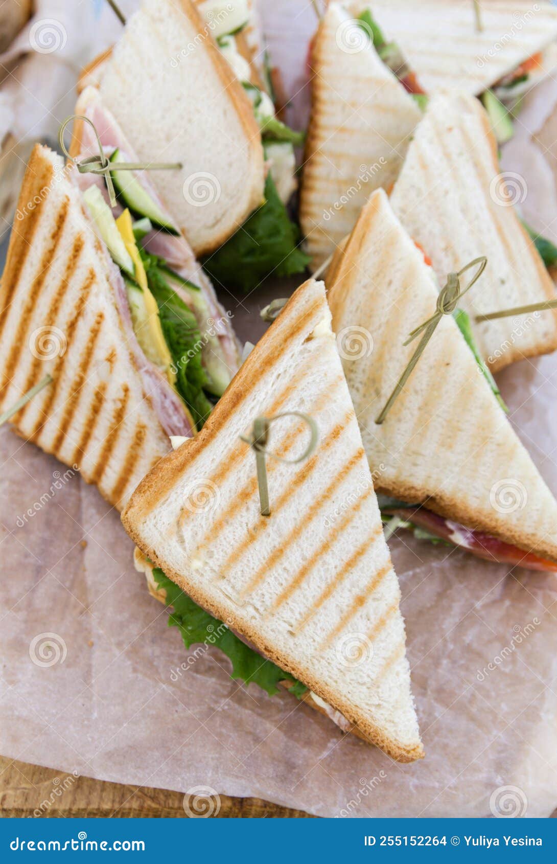 Triangular Shaped Sandwich with Ham, Vegetables and Mayonnaise on a ...