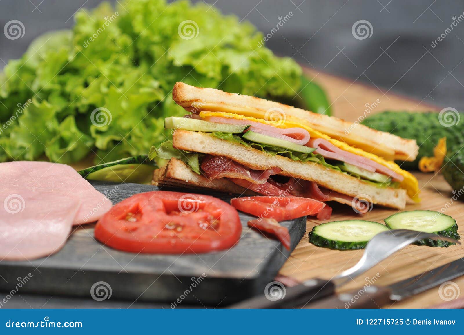 Triangular Shaped Sandwiches with Ham and Omelet on a Plate Stock Image ...