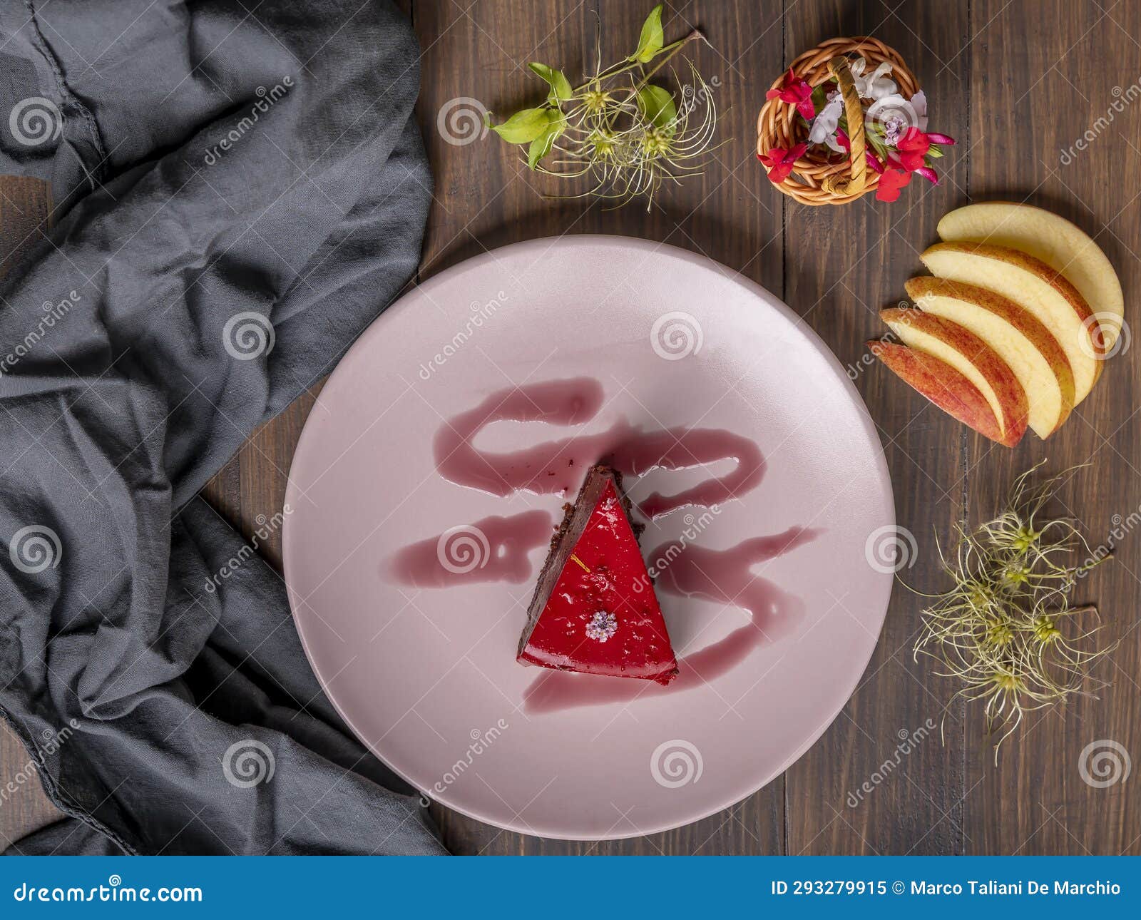A Triangular-shaped Slice of Cake with Strawberry Syrup Shot from Above ...