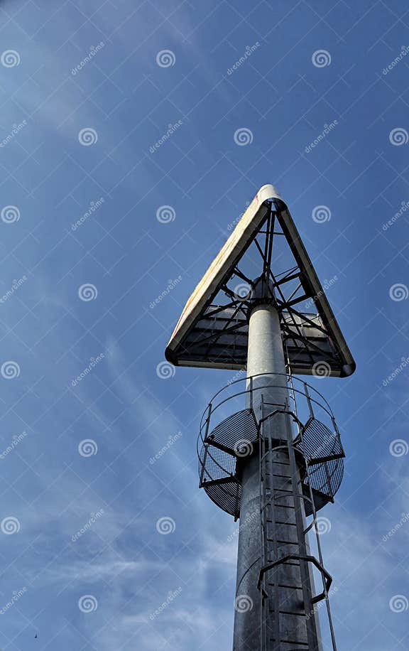 Triangular Sign on a High Steel Pole Stock Image - Image of hightower ...
