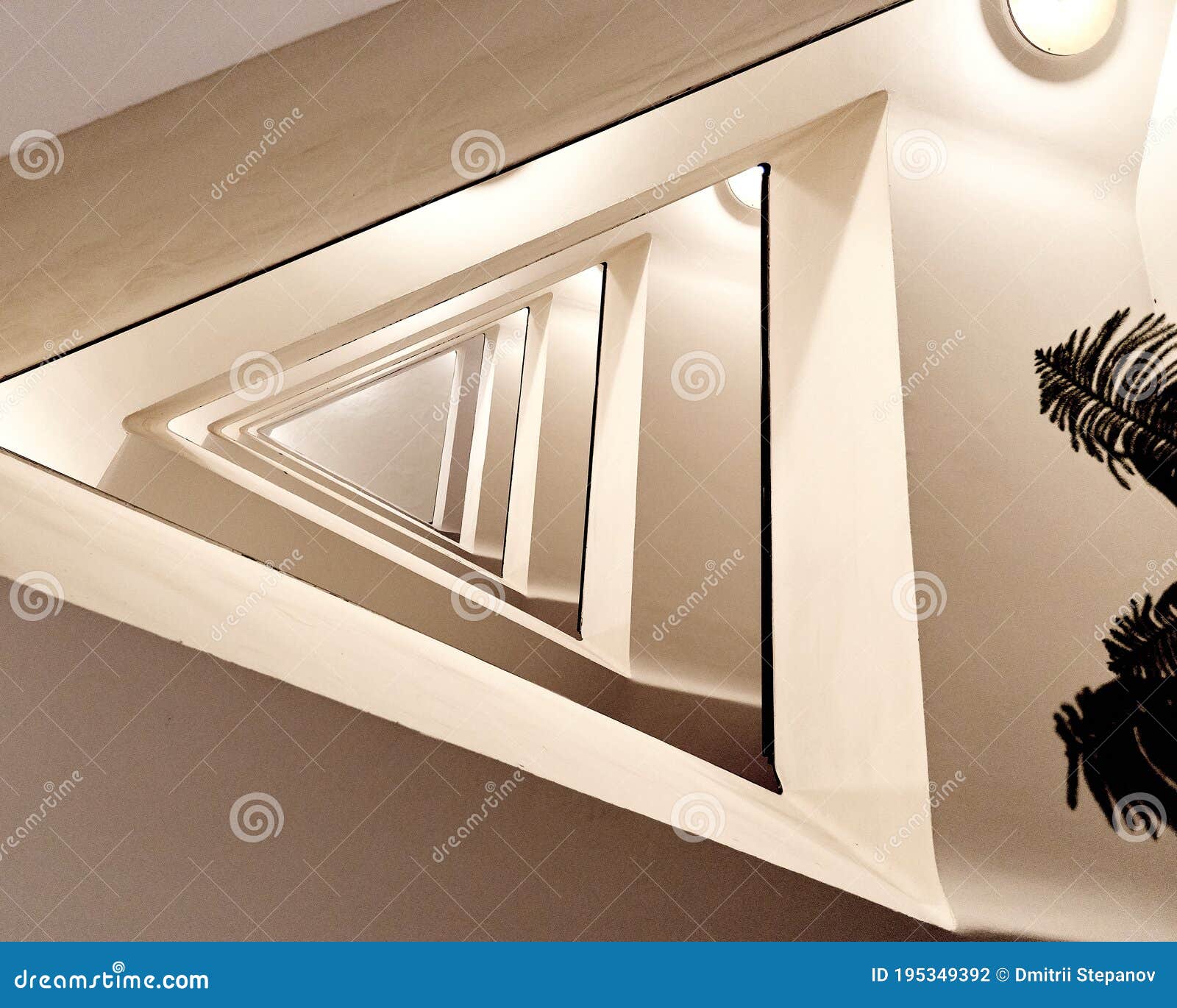 Triangular Spiral Staircase with Black Railings with Patterns Top View ...